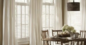Styling Plantation Shutters with Curtains: Expert Guide